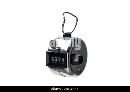 Manual mechanical counting counter on yellow background Stock Photo - Alamy