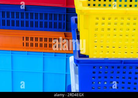 Colorful plastic boxes, logistic concept Stock Photo - Alamy