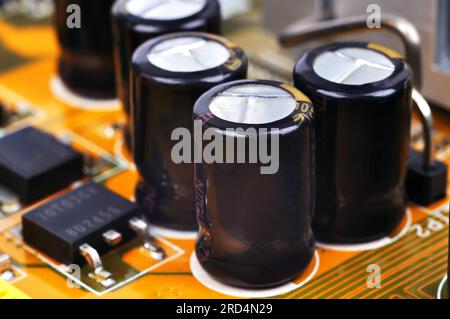 Macro of black capacitors from circuit board Stock Photo - Alamy