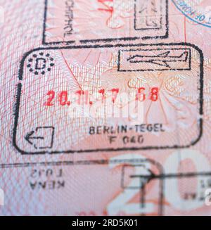 Germany Berlin border crossing stamp in an open passport. Berlin ...