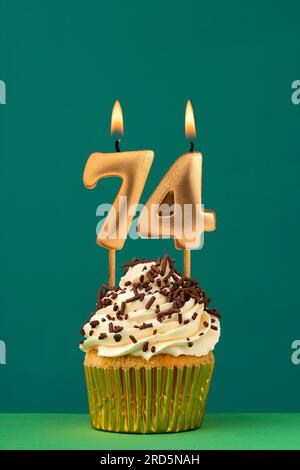 Vertical birthday card with number 74 candle - Green background with ...