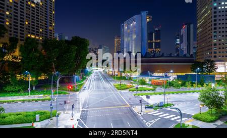 A night view looking along Raffles Boulevard in Singapore at its ...