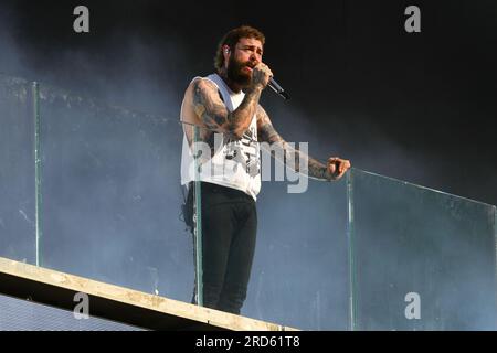 Post Malone performs a free concert on an outdoor stage at TSX Broadway ...