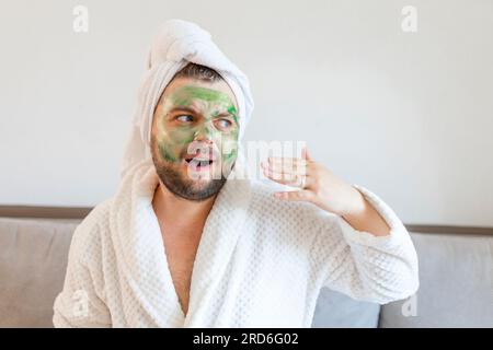 Surprised guy spends hours treating and caring for his skin, applies ...