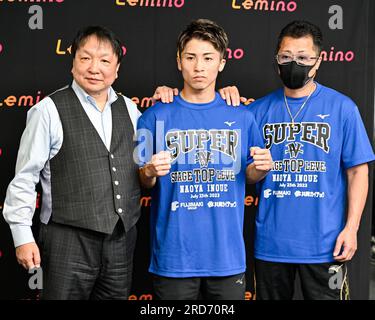 Naoya Inoue of Japan, center, poses for a photo session with his ...