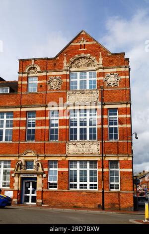 The brick and stone facade of the Tonbridge Library building and ...