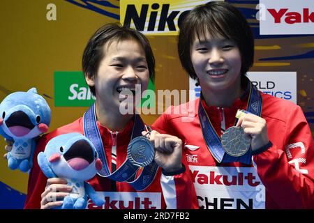 Gold medalist Chen Yuxi of China, centre, stands with silver medalist ...