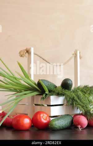 Various farming tomatoes on a white wooden background. Zero waste ...