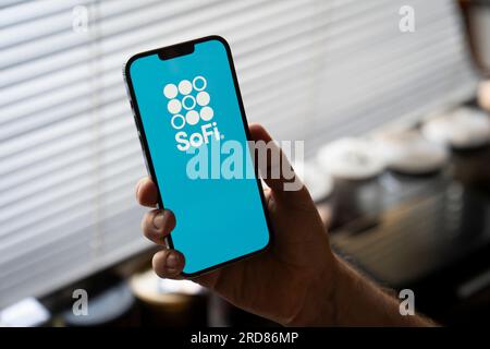 The SoFi bank logo is seen on a mobile device screen in this ...