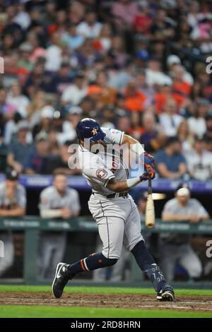 Houston Astros left fielder Corey Julks (9) swings at the pitch in an ...