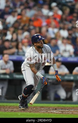 Houston Astros left fielder Corey Julks (9) swings at the pitch in an ...