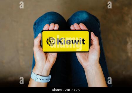 In this photo illustration, Kiewit Corporation logo is seen displayed ...