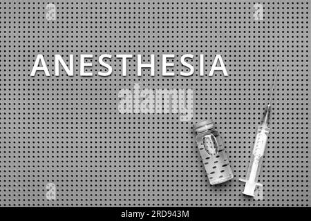 Board with word ANESTHESIA, ampule and syringe on red background Stock ...