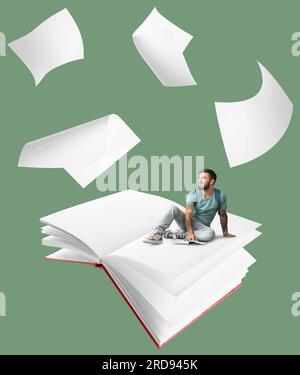 Handsome tattooed student with notebook on yellow background Stock ...