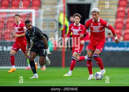 Middlesbrough's Morgan Rogers drives forward under pressure during the ...