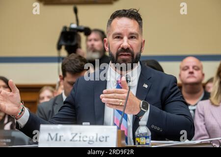 IRS Criminal Investigator Joseph Ziegler, right, and IRS Special Agent ...