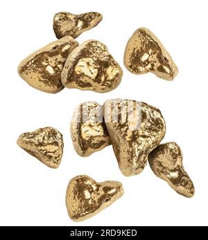 Many gold nuggets falling on white background Stock Photo - Alamy