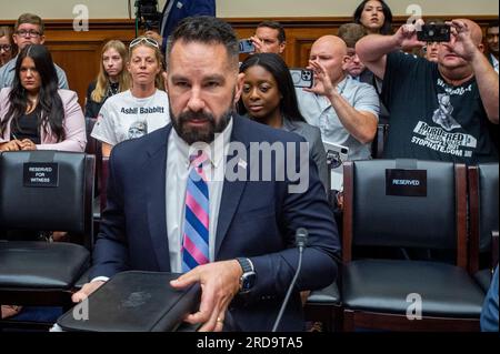 IRS Criminal Investigator Joseph Ziegler, right, and IRS Special Agent ...
