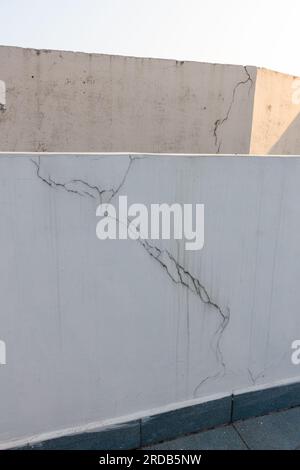 Cracks on the white plaster wall. Abstract design background Stock ...