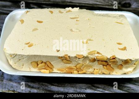 Traditional tahini halva with peanuts or Halawa Tahiniya, the primary ...