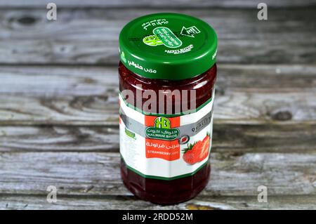 Cairo, Egypt, July 9 2023: Halwani Bros strawberry jam Haalwani bottle ...