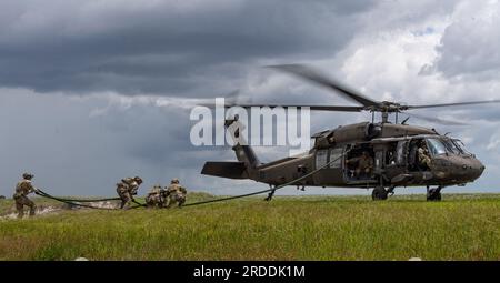 Military members from seven countries conducted Fast Rope Insertion and ...