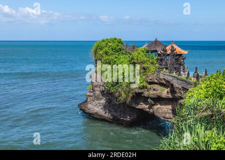A scenic view of the Pura Batu Bolong temple in the Tanah Lot in the ...