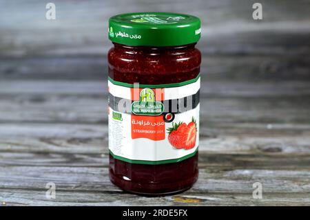Cairo, Egypt, July 9 2023: Halwani Bros strawberry jam Haalwani bottle ...