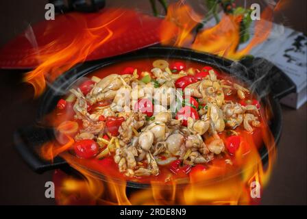 Frog with Pickled Pepper, bullfrog in sour soup Stock Photo - Alamy