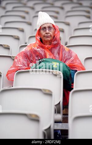 A England fan wearing a poncho ahead of the FIFA World Cup Group L ...