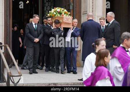The coffin of Grace O'Malley-Kumar is carried from her funeral at ...