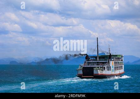 Ferry boat exhausting dark polluted smoke, Thailand Stock Photo - Alamy