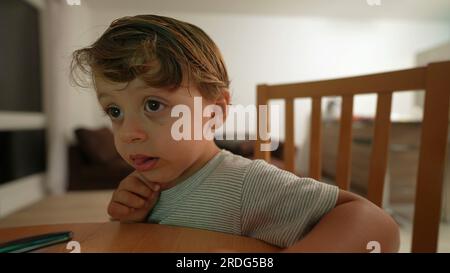 Little boy hypnotized by screen kid watching movie at home Stock Photo ...
