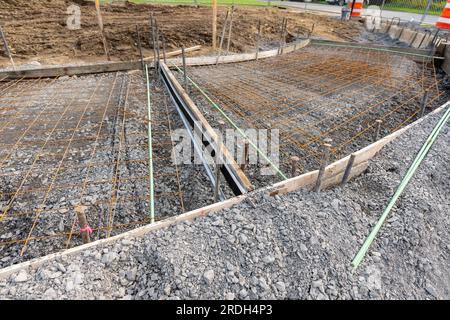 Welded wire mesh, WWM, installed within a sidewalk concrete form prior ...