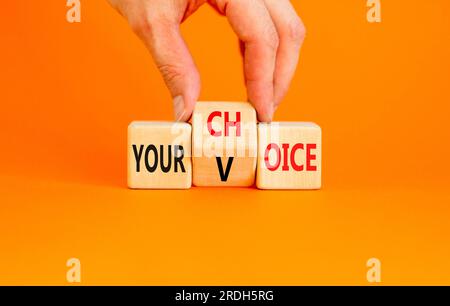 Your voice choice symbol. Businessman turns wooden cubes and changes ...