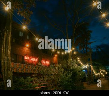 neon inscription at the post-industrial event at the shipyard in gdansk ...