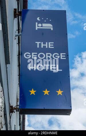 In Rathfriland, Co. Down, Northern Ireland a road sign points to sister ...