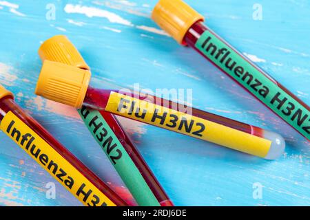 Tubes with blood samples for hepatitis virus test on laboratory form ...