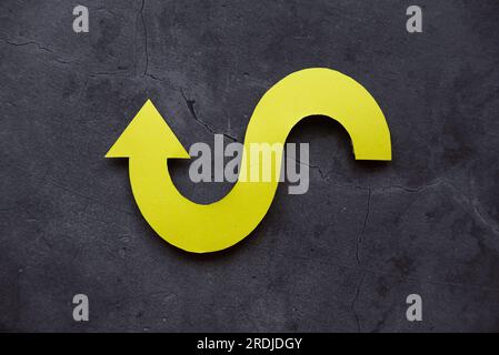 Yellow arrow pathway sign. Future life with direction or obsctacle ...