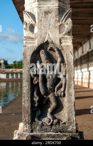 The Shivaganga tank surrounded by colonnades in the third prakara ...