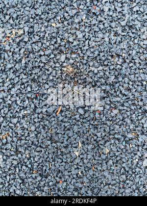 Black all-weather synthetic track surfacing made of polyurethane used ...