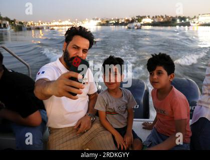 Baghdad, Iraq. 16th July, 2023. People take a river taxi in Baghdad ...