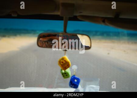 A tour guide seen driving a vehicle en route to the Black Desert, where ...