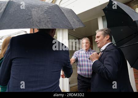 Labour candidate Alistair Strathern (right) leaves Shefford Town ...