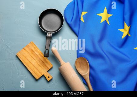 Flag of European Union with kitchen utensils on grey background Stock ...