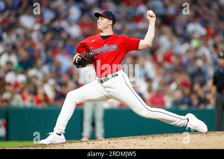 Cleveland Guardians relief pitcher Tim Herrin fields a ground out by ...