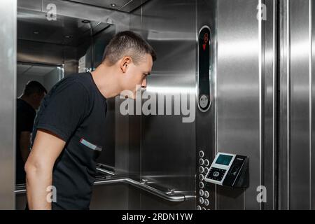 The fingerprint access control terminal with face recognition function installed in the elevator ...
