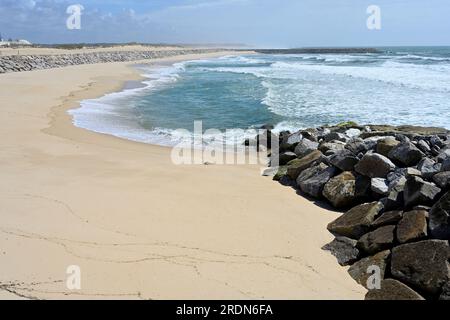 Praia de Paramos, long sandy beach with stone sea defences by Espinho ...