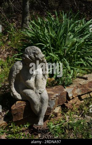 Guardian angel statue in light as a symbol of strength, truth and faith ...