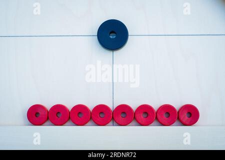 Novuss table with discs and cue stics Stock Photo - Alamy